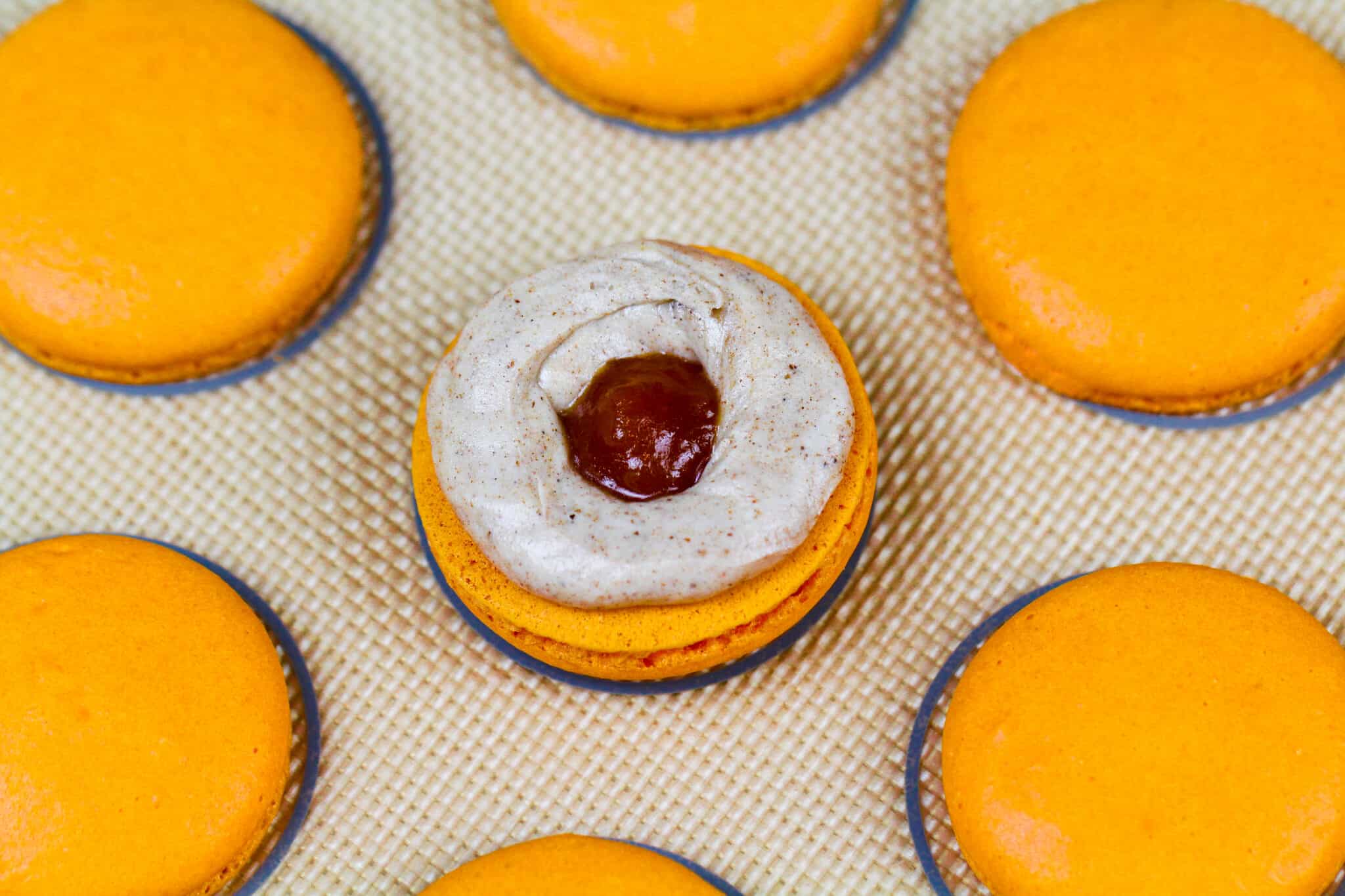 Pumpkin Macarons with Spiced Buttercream - Chelsweets