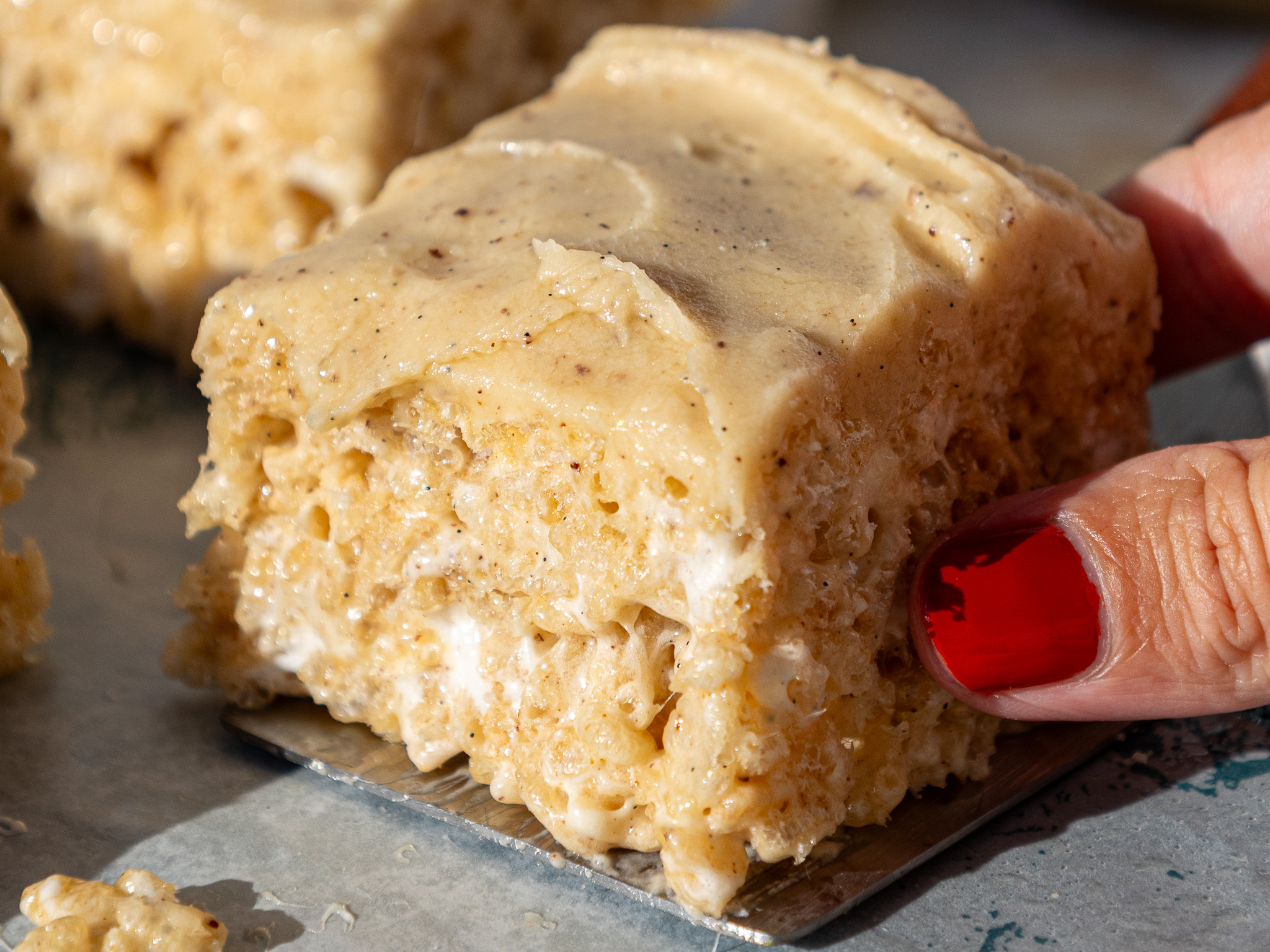 Gooey Brown Butter Rice Krispie Treats (with Frosting!)